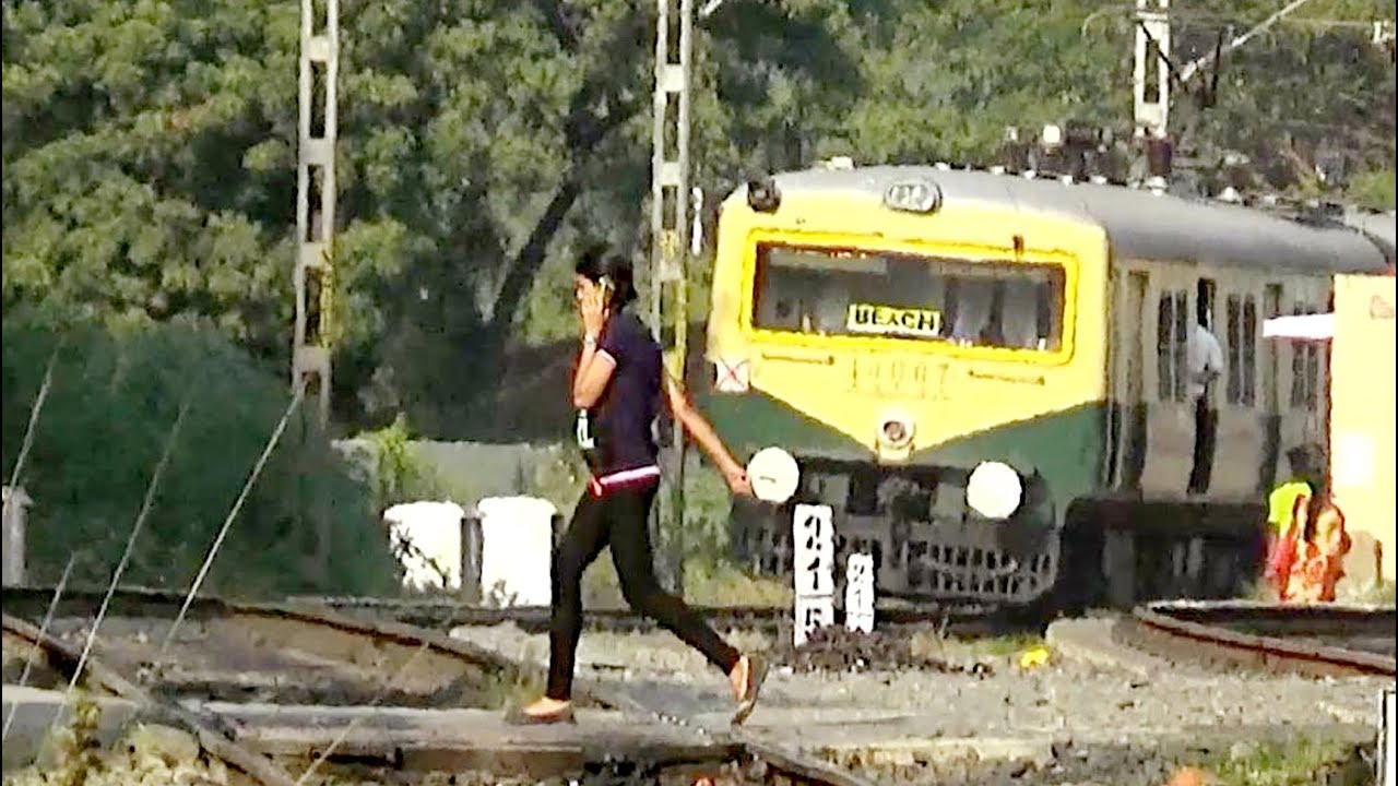 Don't Use Mobile Phone While Walking in the Rail Line/ Be Careful ...