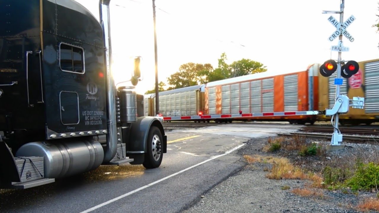 Truck Waits for Train at The Railroad Crossing - YouTube