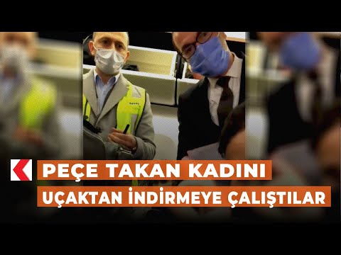 Peçe takan kadını uçaktan indirmeye çalıştılar