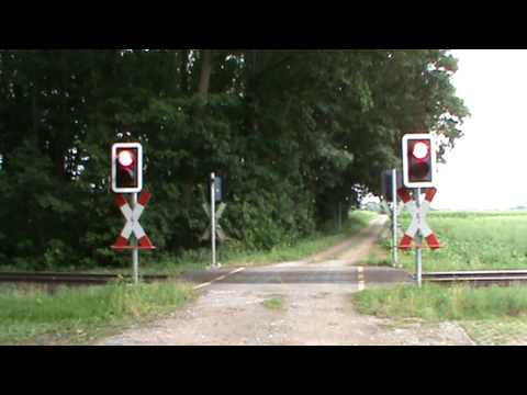 German railroad crossing and Eurobahn passenger train passing - YouTube