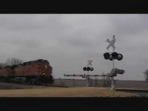 CN Freight Train at Railroad Crossings - YouTube