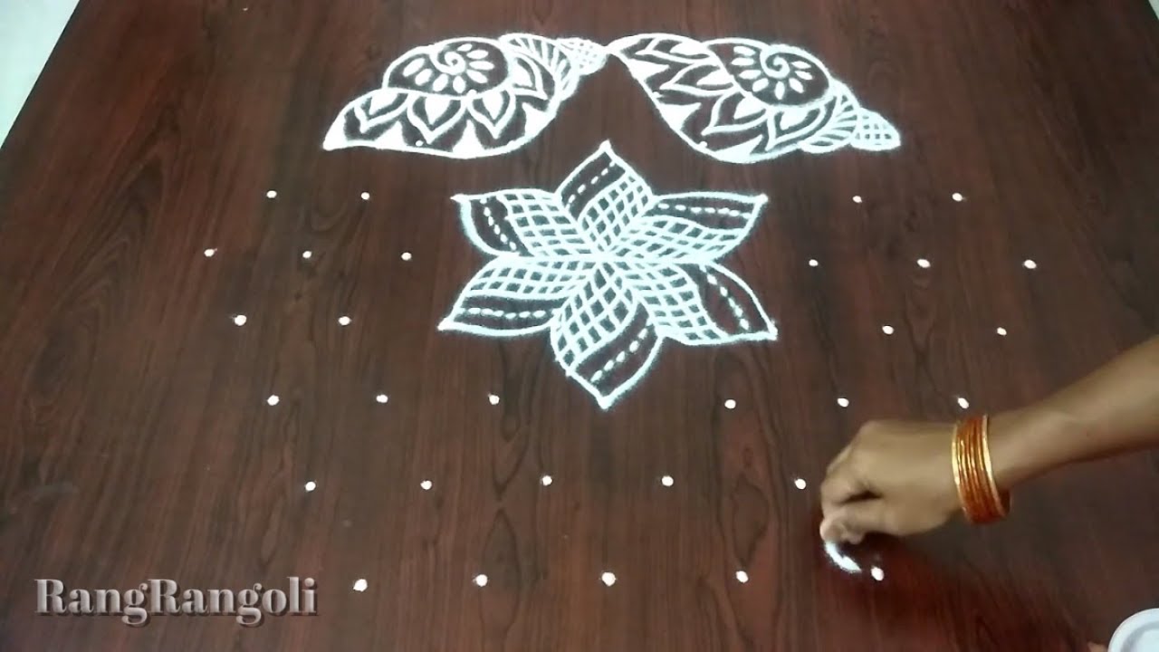 Beautiful shanku kolam with 9* 5 dots | shanku rangoli designs | shanku ...