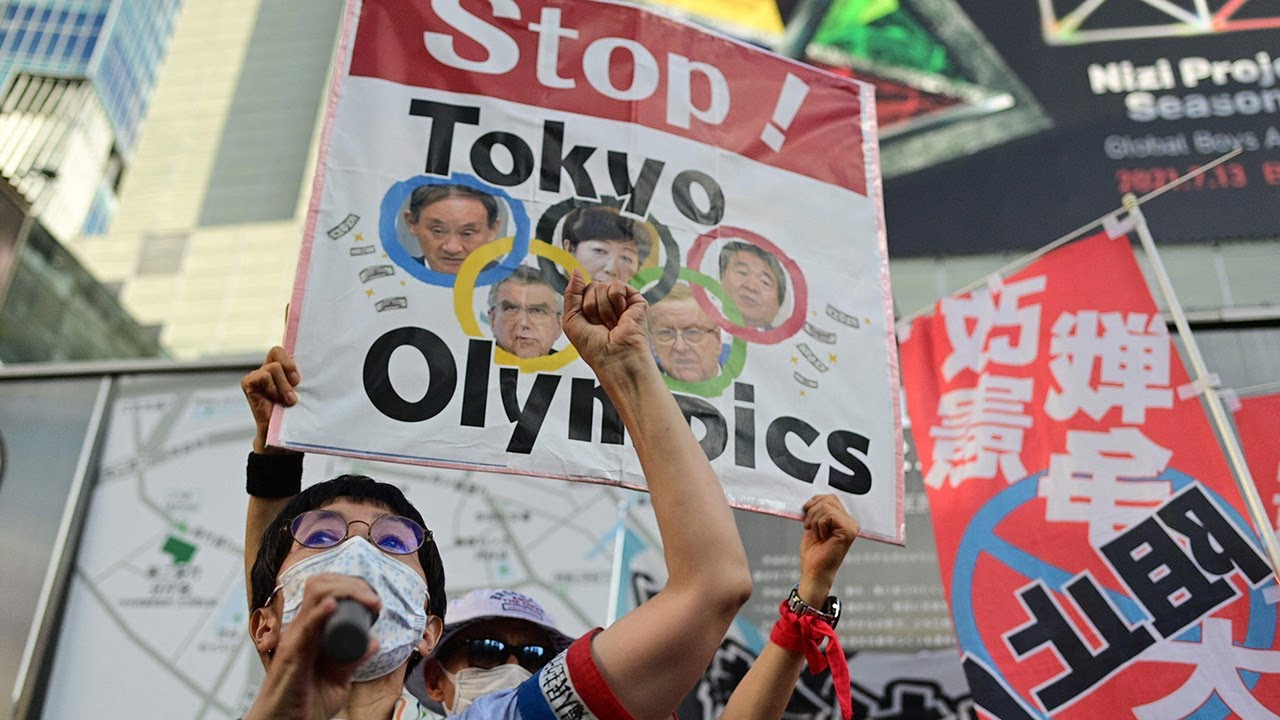 Tokyo Olympics: Protests take place during opening ceremony - YouTube