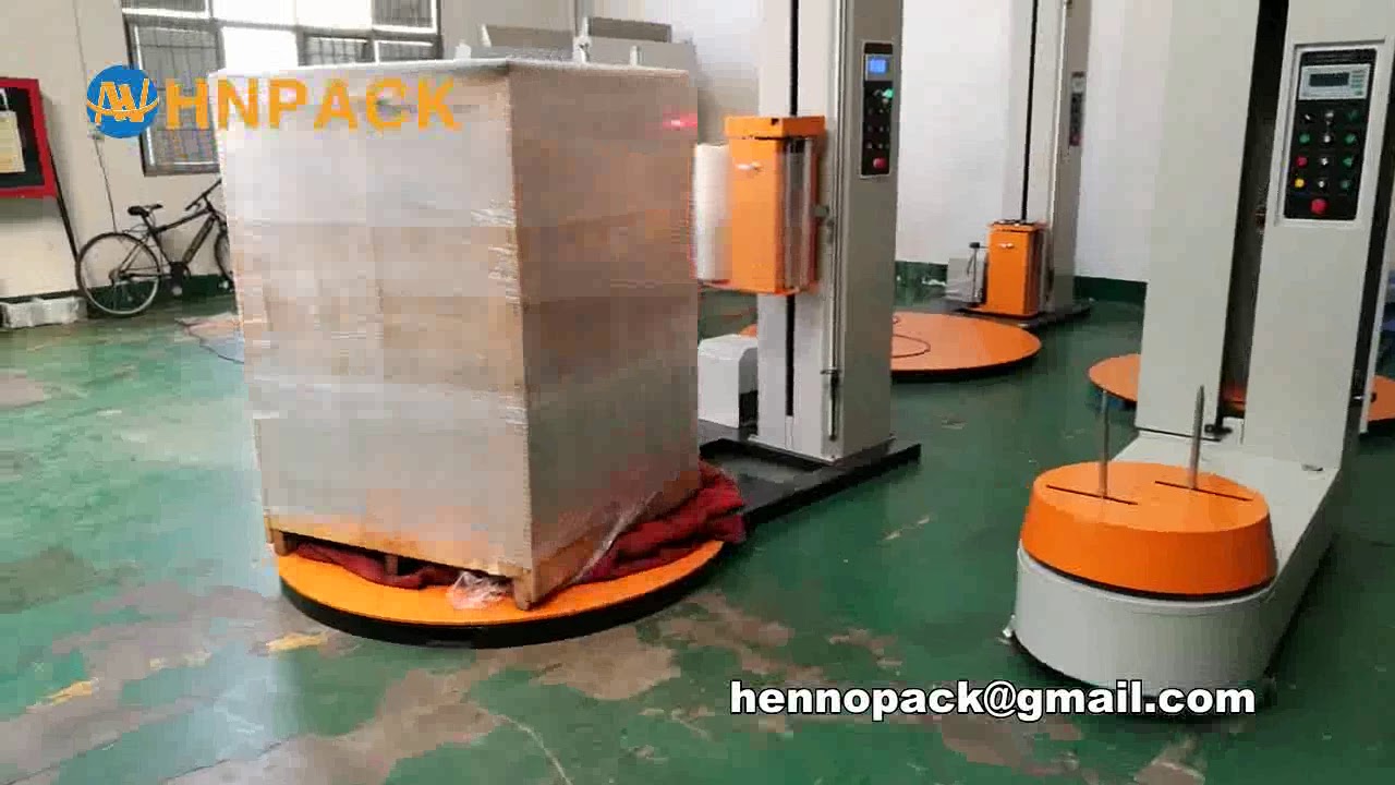 Hennopack semiauto pallet turntable stretch film wrapper - YouTube