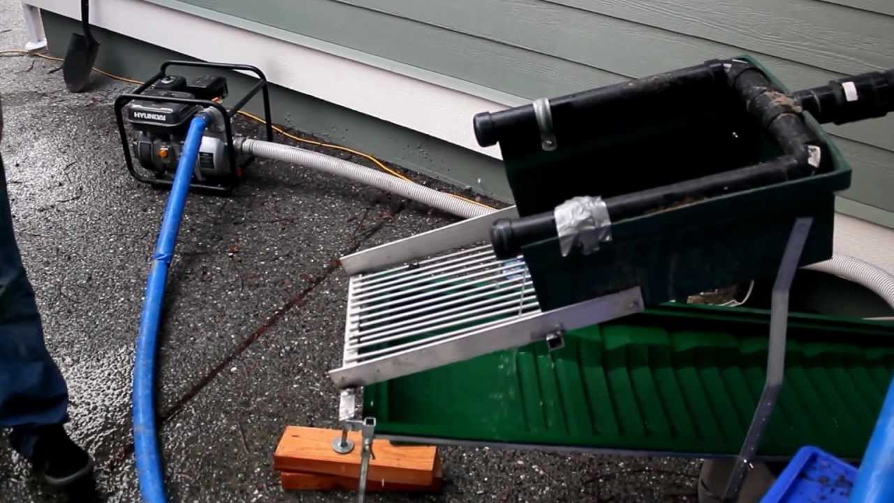 Highbanker sluice for gold in driveway - YouTube