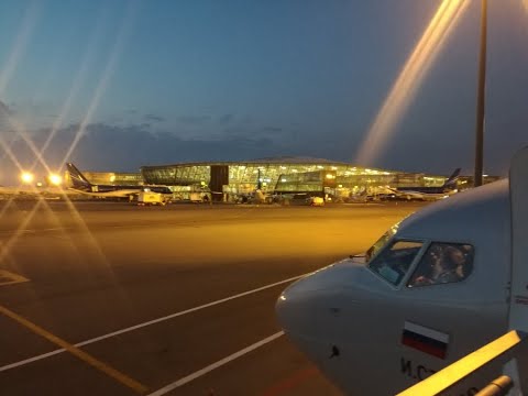 Aeroflot 1853 departure from Heydar Aliyev International Airport with open overhead bin