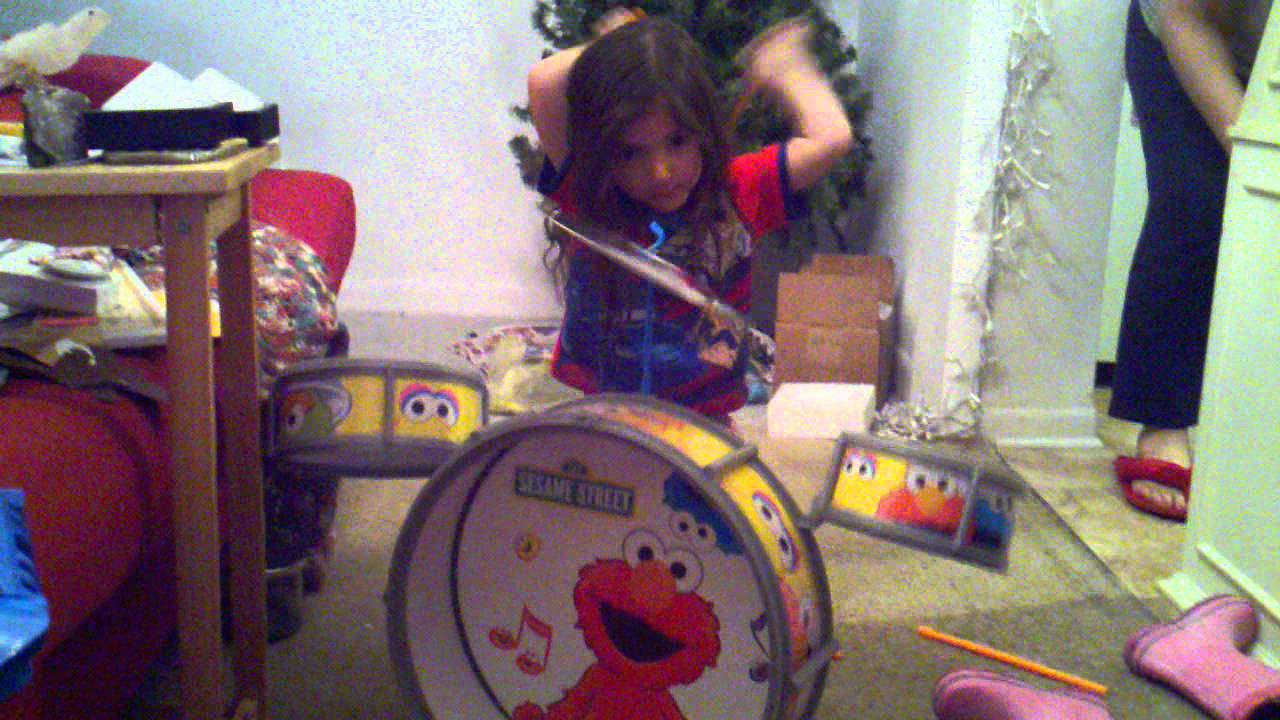 Sophia playing her Elmo Drums - YouTube