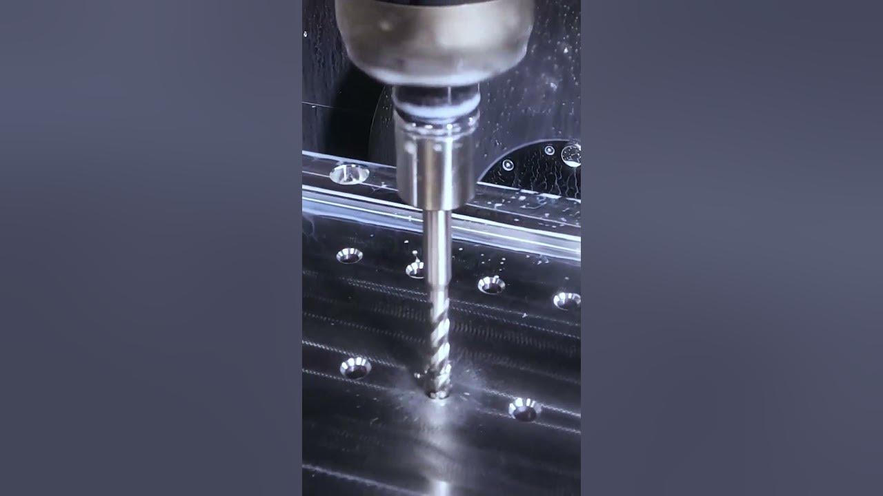CNC machine tapping threads - YouTube