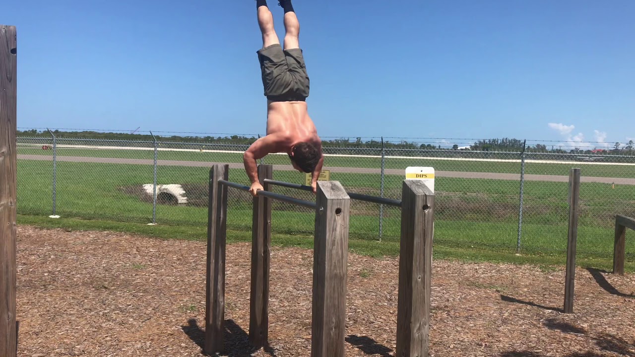 Parallel bar lsit to handstand - YouTube