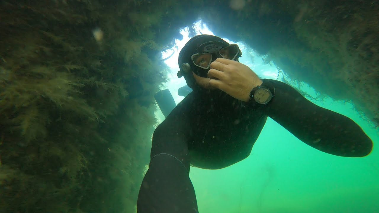 Freediving through a cave with one breathe. - YouTube