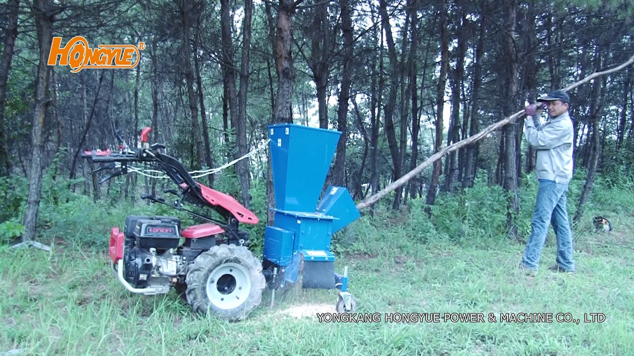 wood chipper with two wheel tractor - YouTube