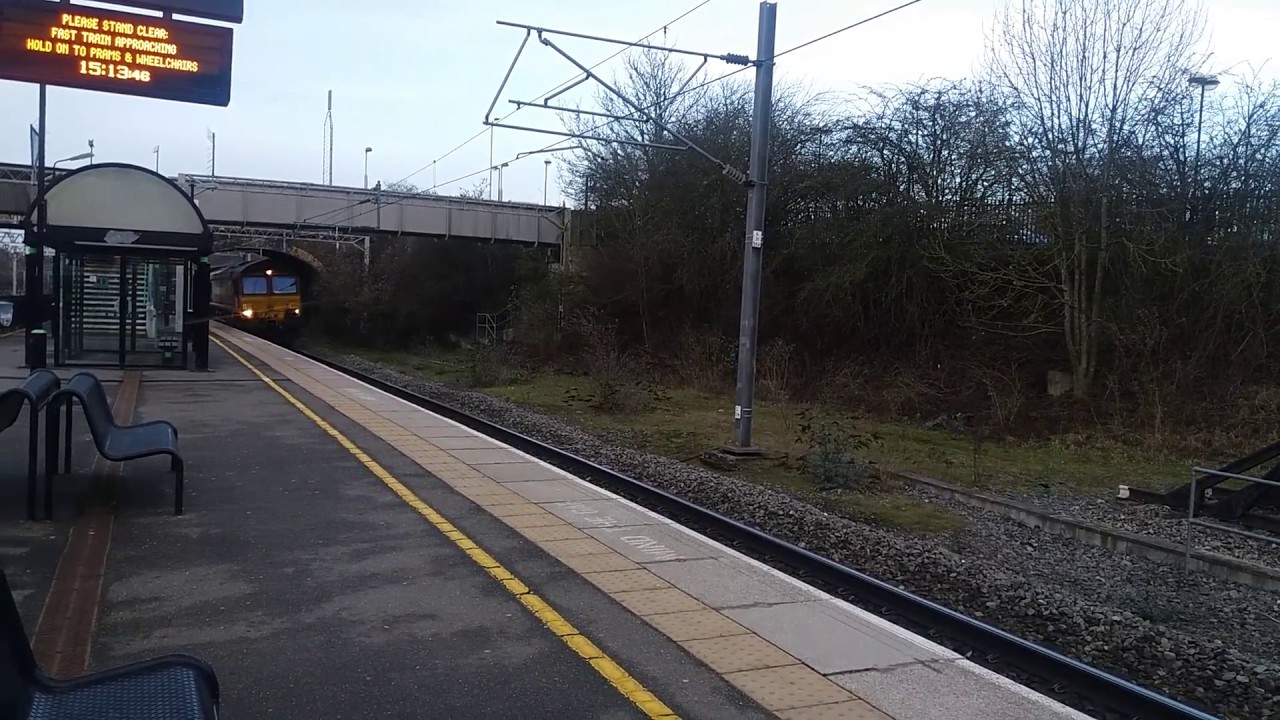DB Cargo UK Class 66 - 66121 Passes Tring At Speed Hauling The Water ...