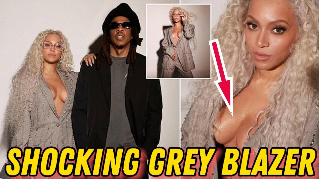 stunning busty display in a plunging grey blazer as she poses for sizzling snaps with husband ...