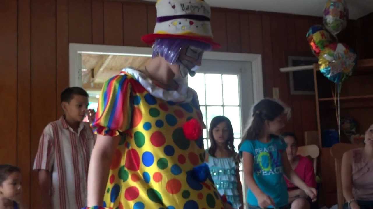 Lulu Clown playing with kids party rentals on Four J Bouncer - YouTube