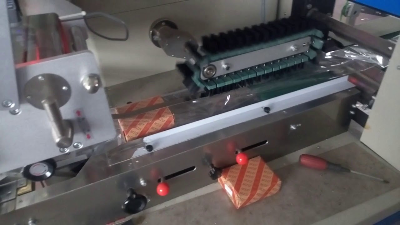 Horizontal packing machine - Product position adjusting - YouTube