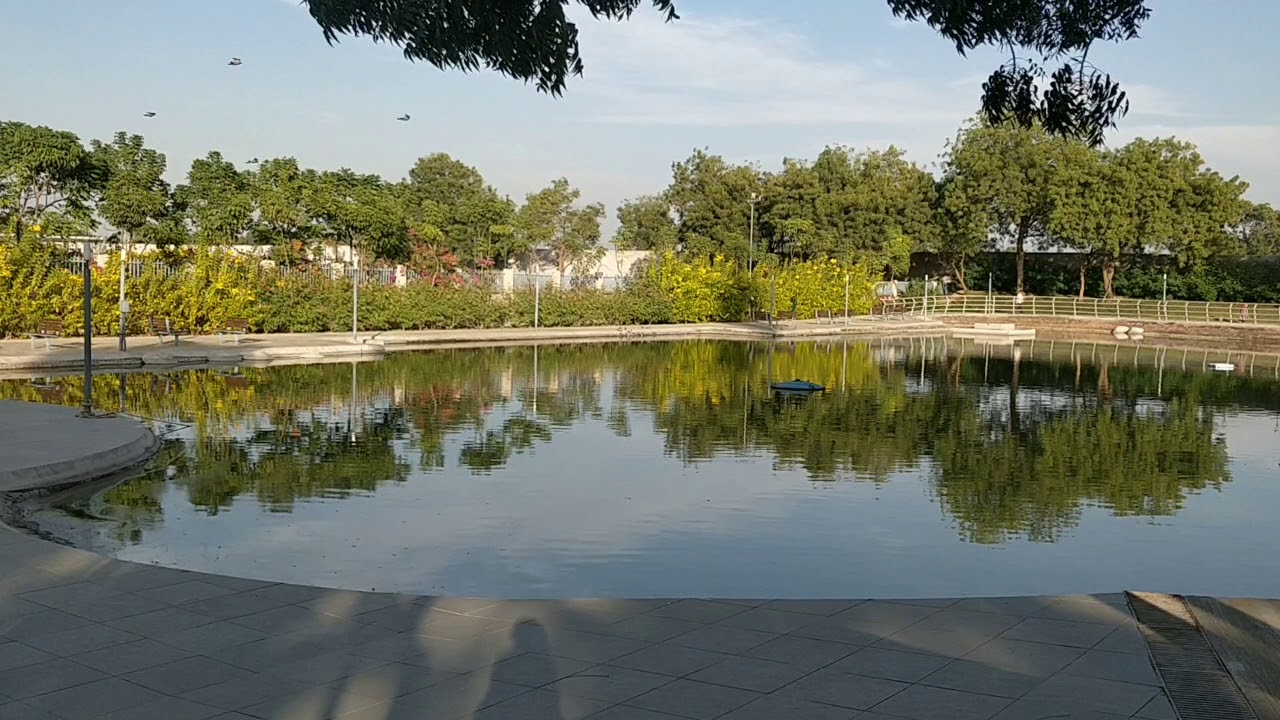 ATPL Adalaj Trimandir Ashram serene lake - YouTube
