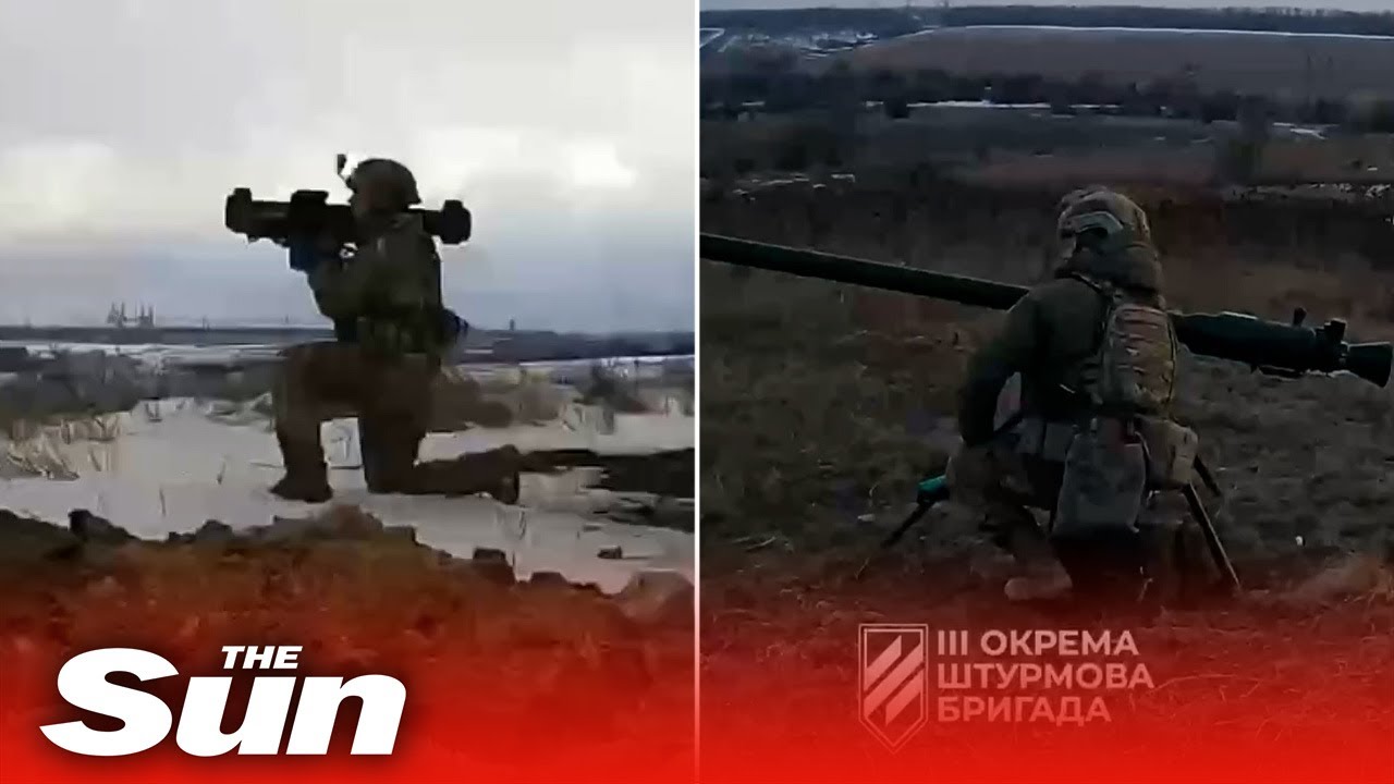 Ukrainian soldiers fire at Russian positions with rocket launchers and ...