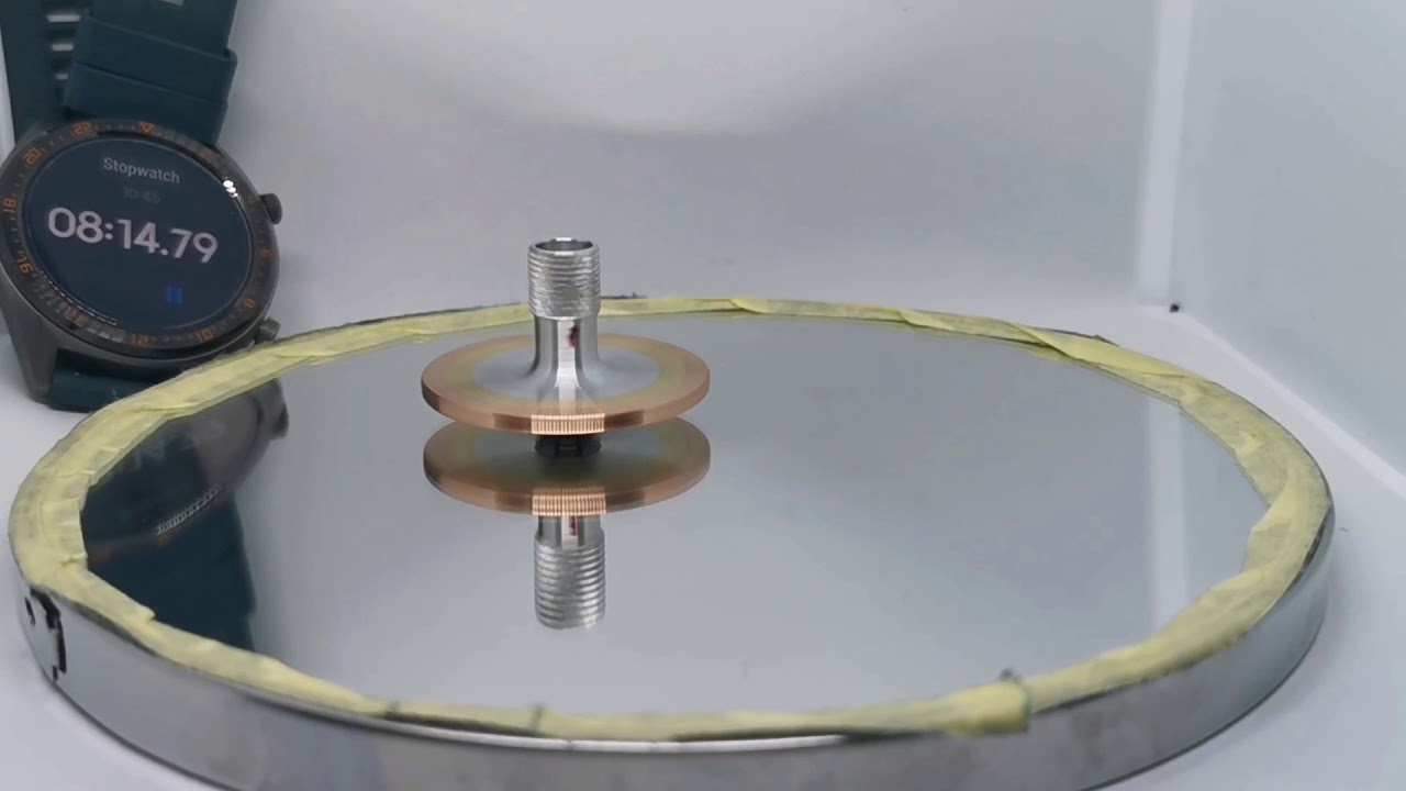 Precision spinning top - YouTube