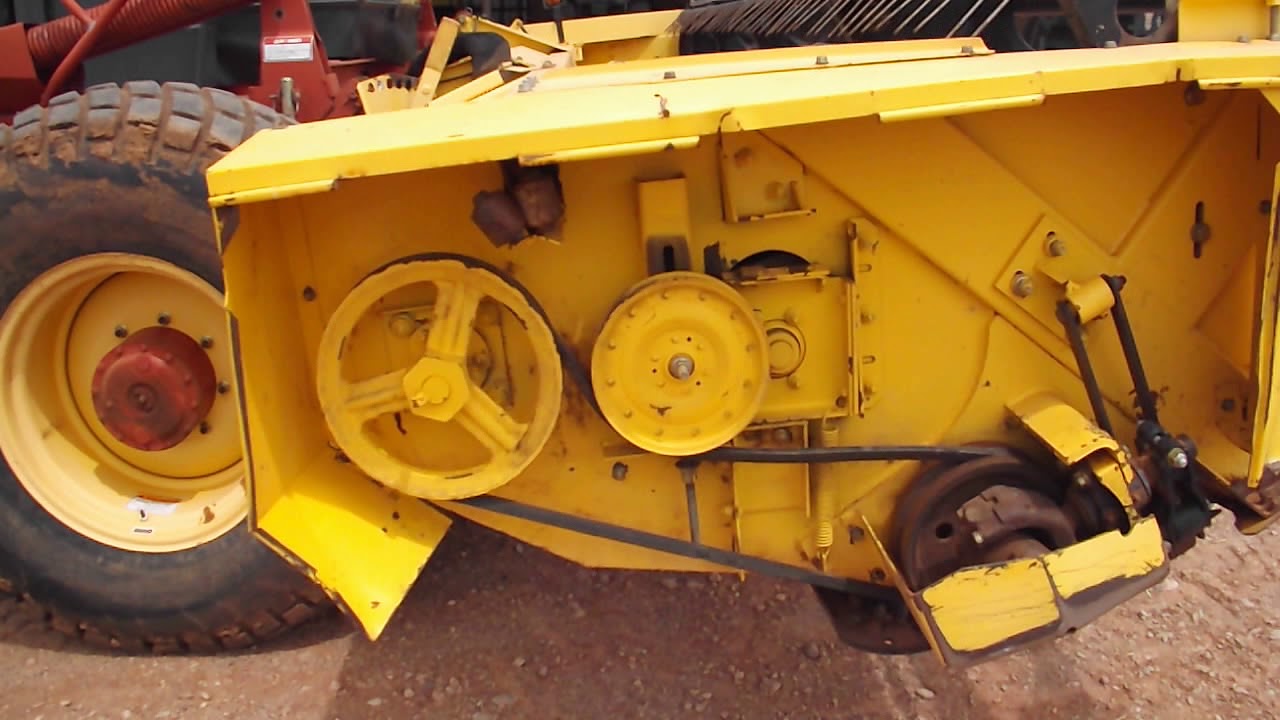 DB1688 New Holland HW320 swather windrower conditioner - YouTube