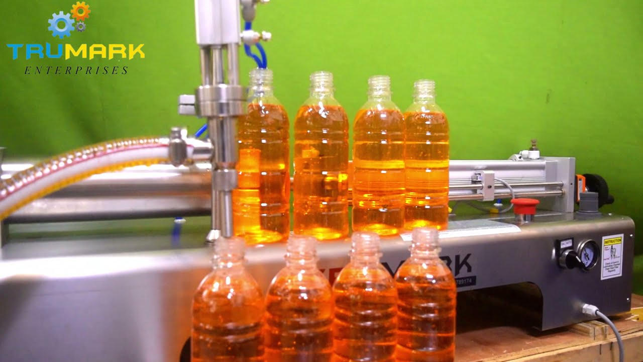 SEMI - AUTOMATIC OIL FILLING AND CAPPING MACHINE - YouTube