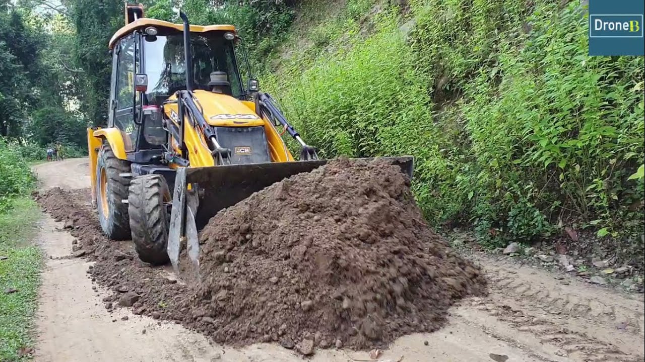 Hilly Road Ruts and Backhoe Loader-Filling Road Ruts after Rain - YouTube