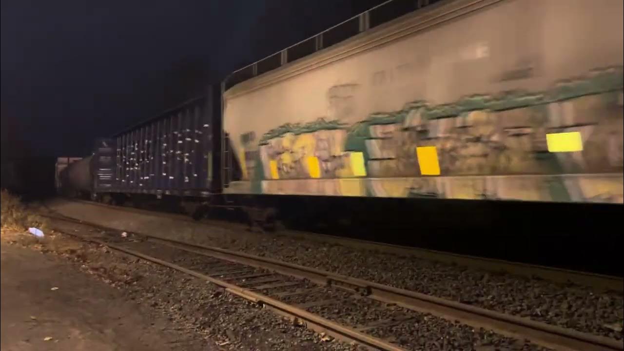 CSX 68 CW44AC leads CSX M404 hauling ass through Piscataway w/CSX 4423 GP40-2 trailing & a Nice ...