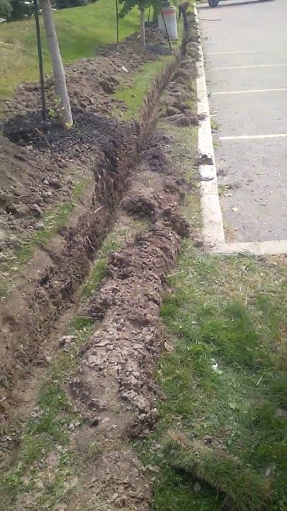 digging a 2ft deep & long Trench to run underground wire for electrical ...