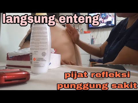 Pijat refleksi [[ pijat punggung wanita sakit