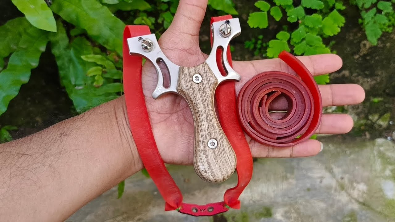 How to make a rubber slingshot from carrom table rubber#slingshot # ...