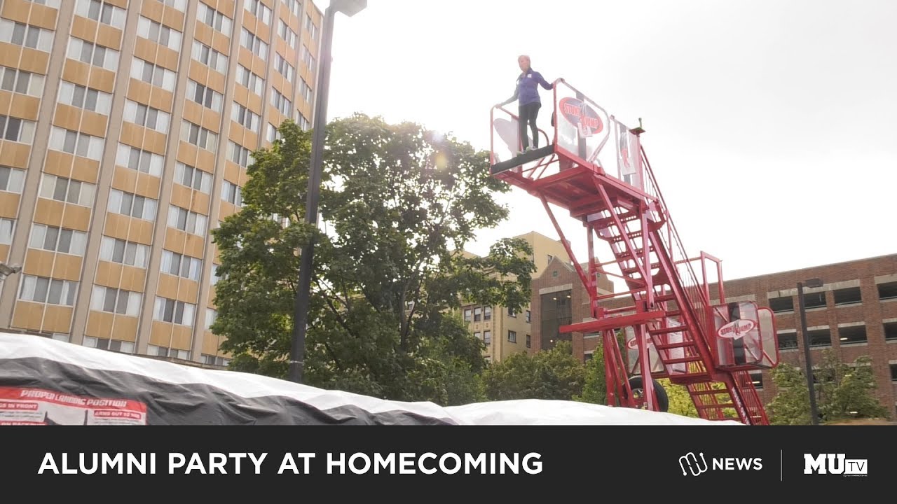Homecoming block party attracts alumni - YouTube