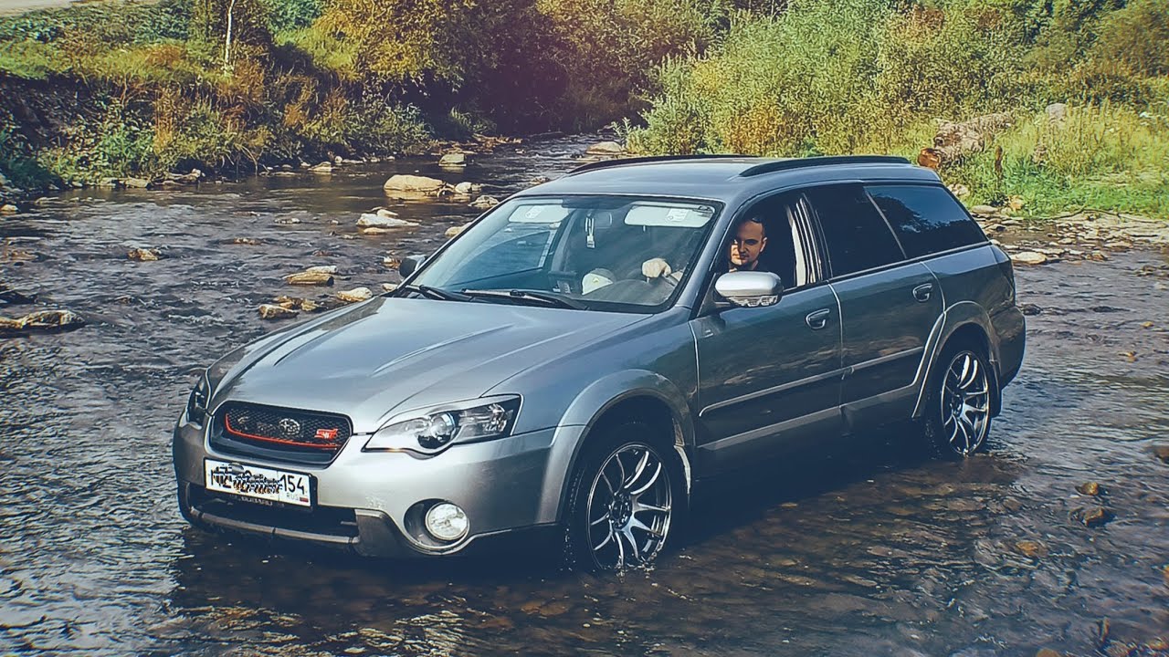 Subaru Outback fords in the mountains - YouTube