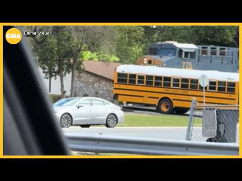 School bus driver arrested after driving bus onto train tracks