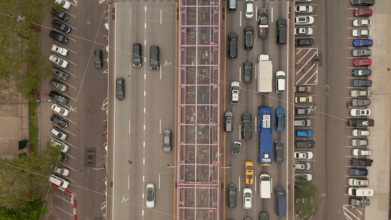 AERIAL: Overhead Top Down Birds View of bridge with heavy car traffic ...