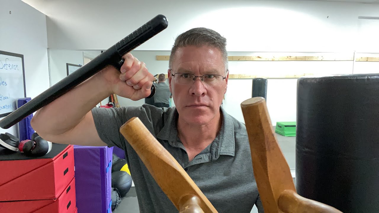 Prepper self defense tools: how to use the Tonfa for self defense - YouTube