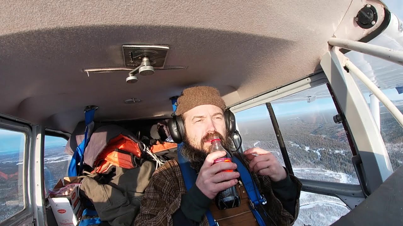 Flying the Stinson over the Farewell Burn and Big River. Ski landing at ...