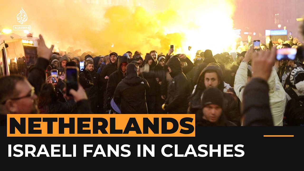Israeli football fans clash with protesters in Amsterdam - YouTube
