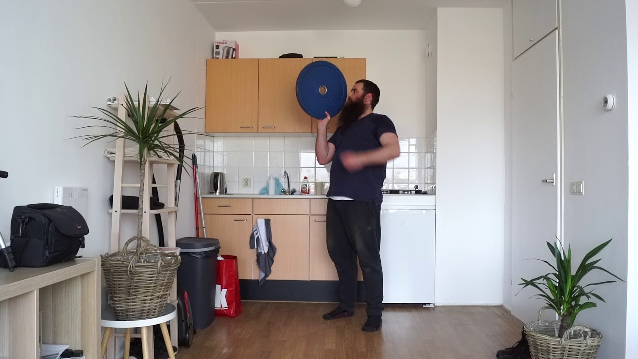 20 kilogram plate balancing with one hand with left and right - YouTube