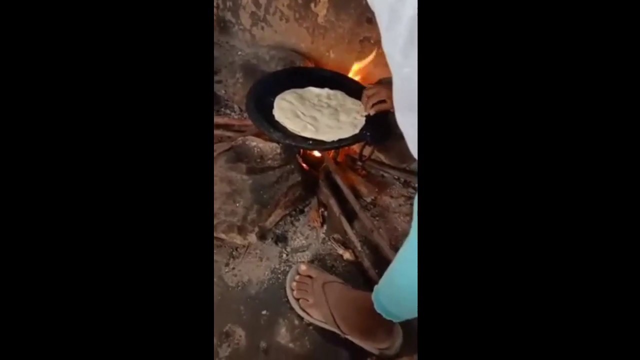 River Jordan Orphanage daily corn grinding routine - YouTube