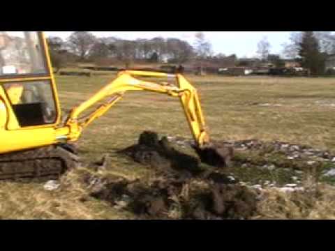 DIGGING OUT FOR A DUCK POND - YouTube