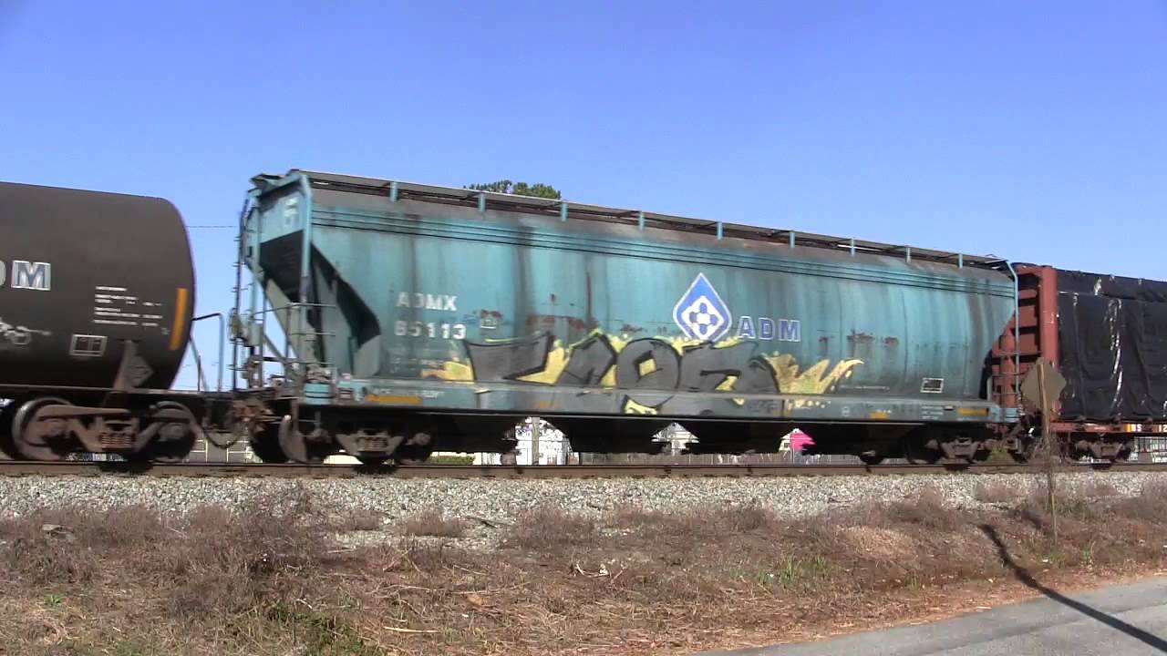 Norfolk Southern C44-9W 9826 leads NS 152 through downtown Valdosta, GA ...