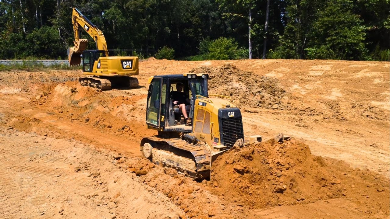 Digging out a pond with an excavator and a bulldozer. - YouTube
