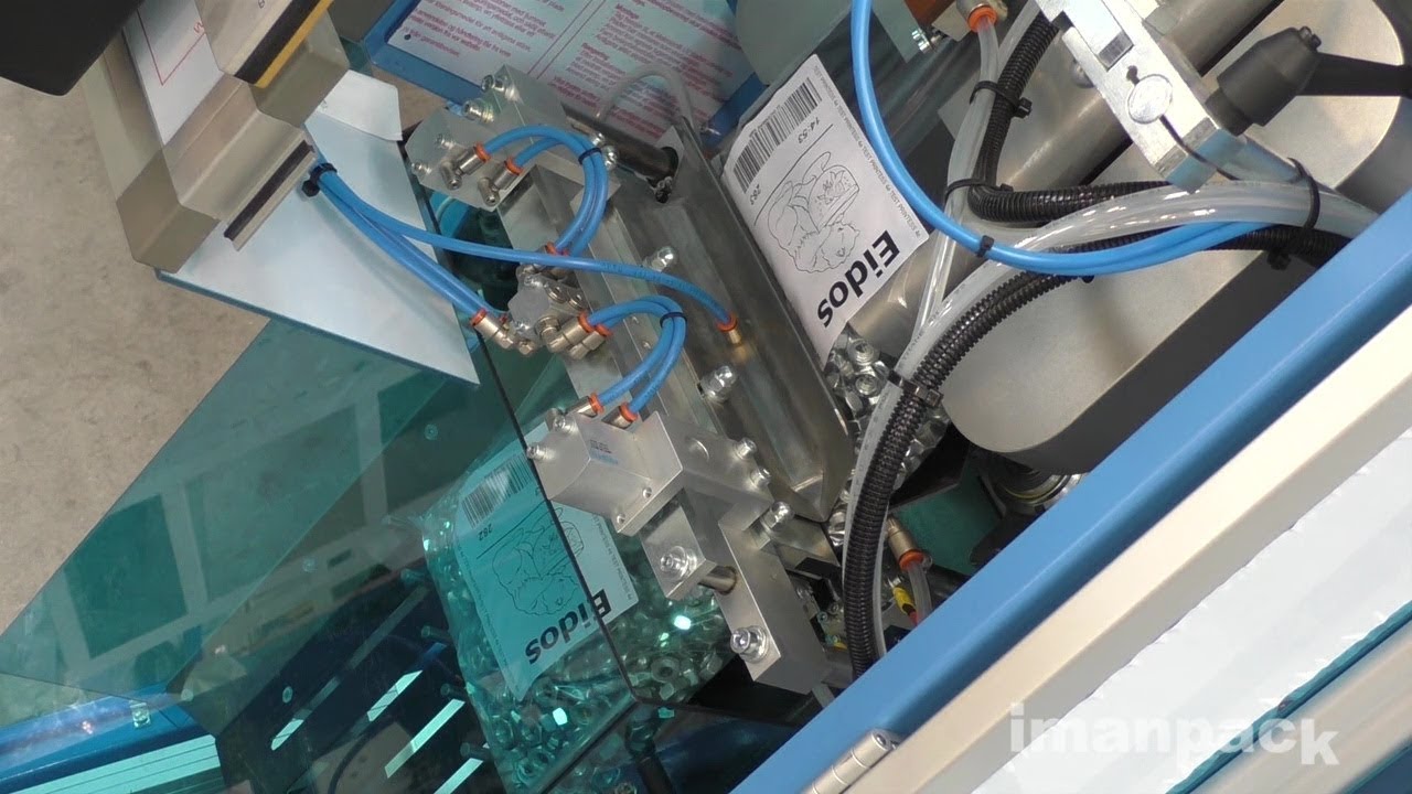 Inclined packaging machine with special loading device for hardware ...