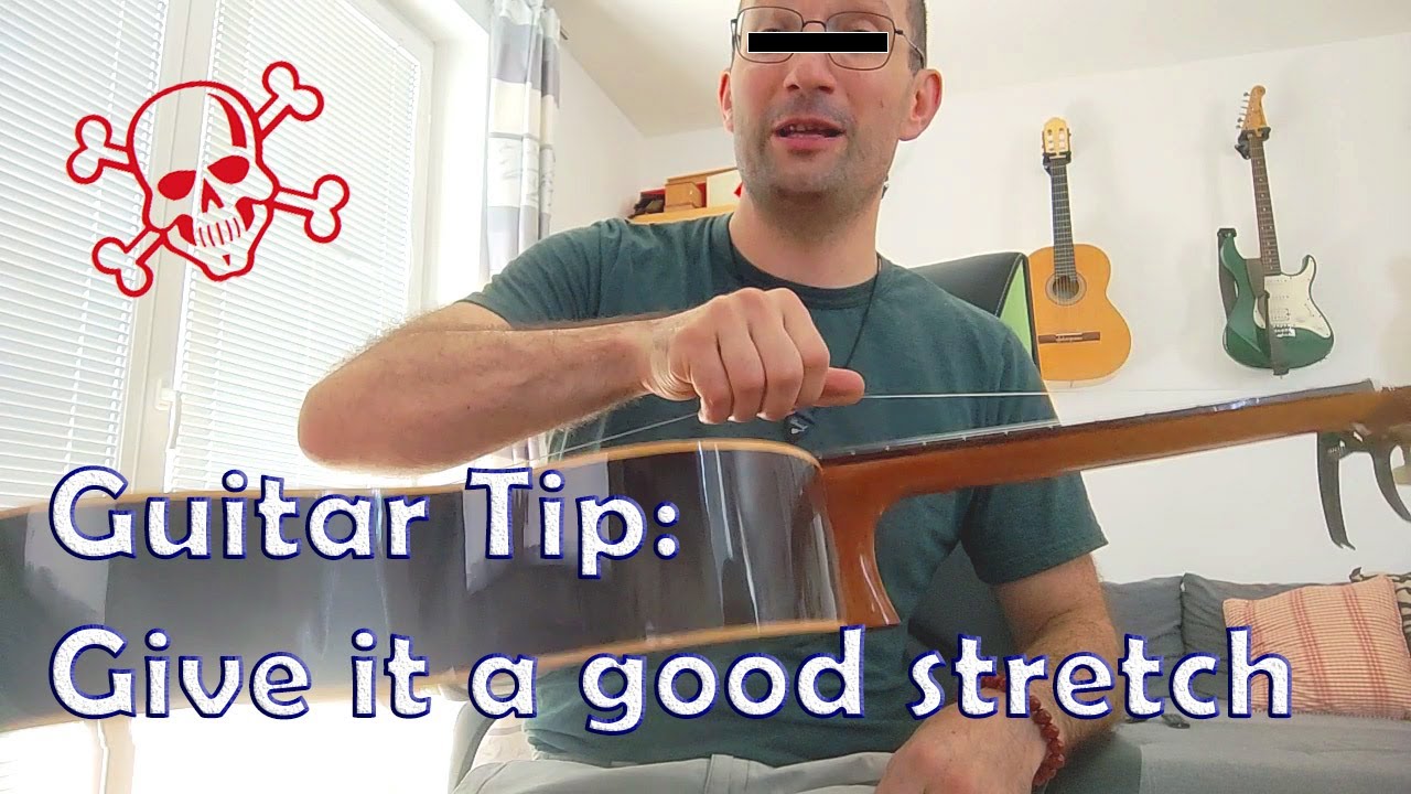 Guitar TIP: stretching strings ☠ - YouTube