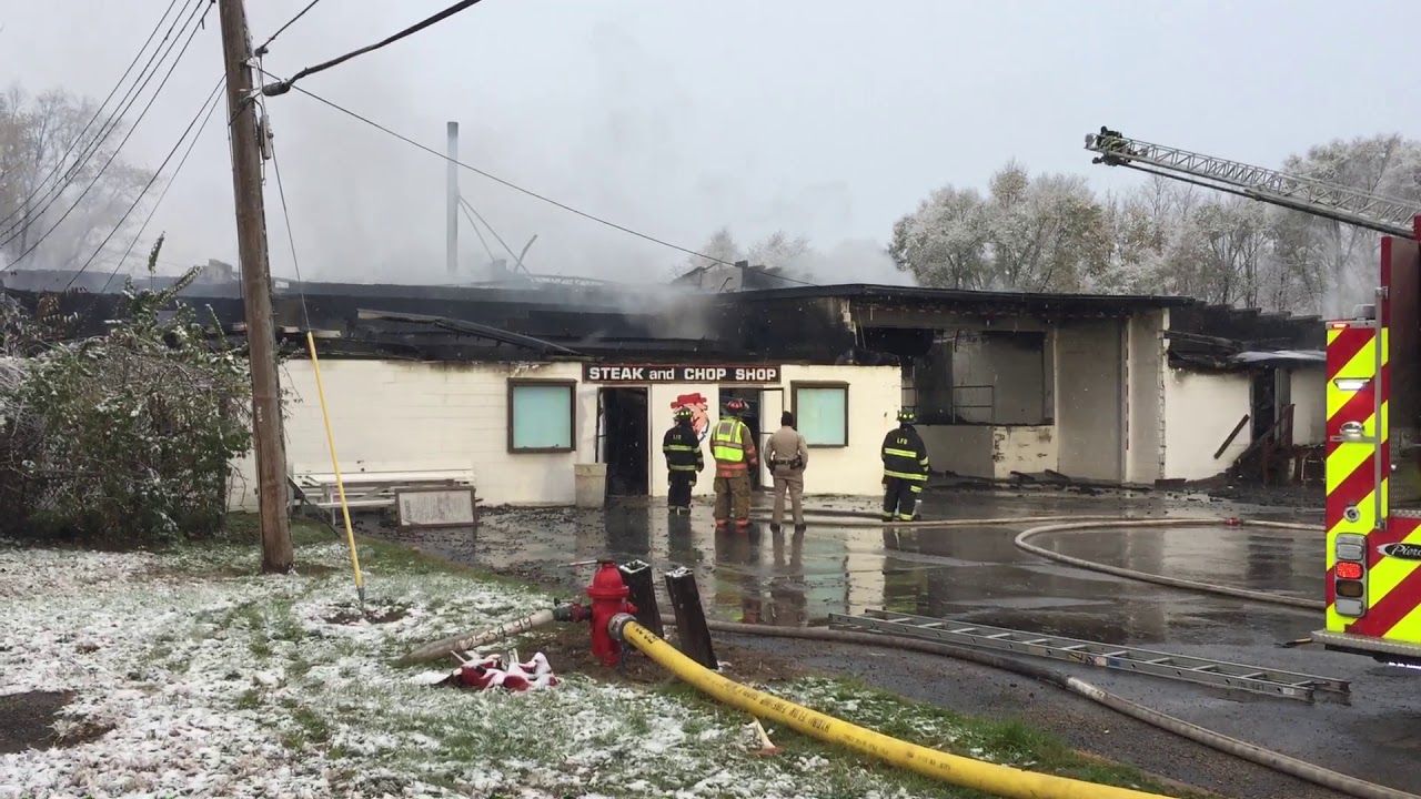 Raber Packing Co. still smoldering the morning after big fire - YouTube