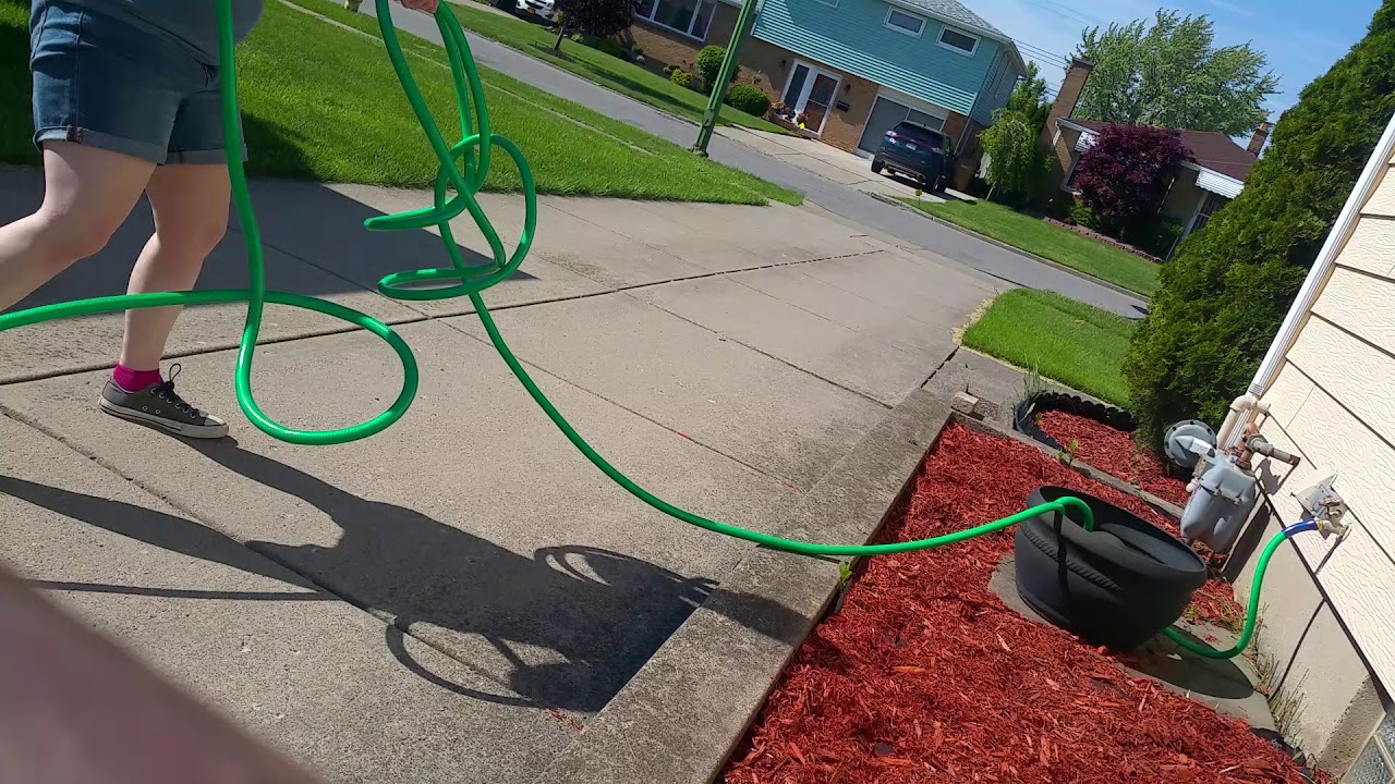 Crafty Fox Uses Flow Arts to Untangle the Garden Hose - YouTube
