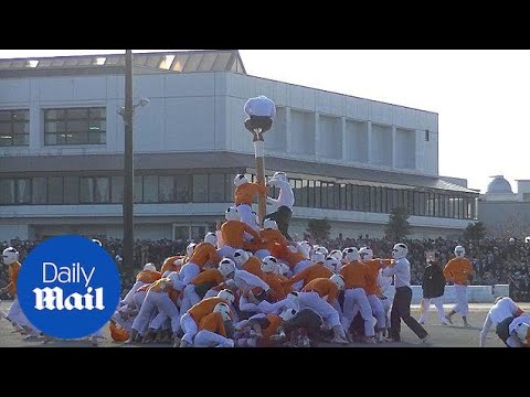 Bizarre Japanese sport where men fight to get to the top of pole - Daily Mail