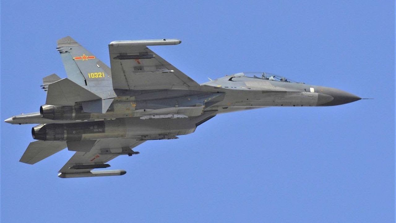 Un J-11 chino se enfrenta a un avión de la Marina de Estados Unidos - YouTube