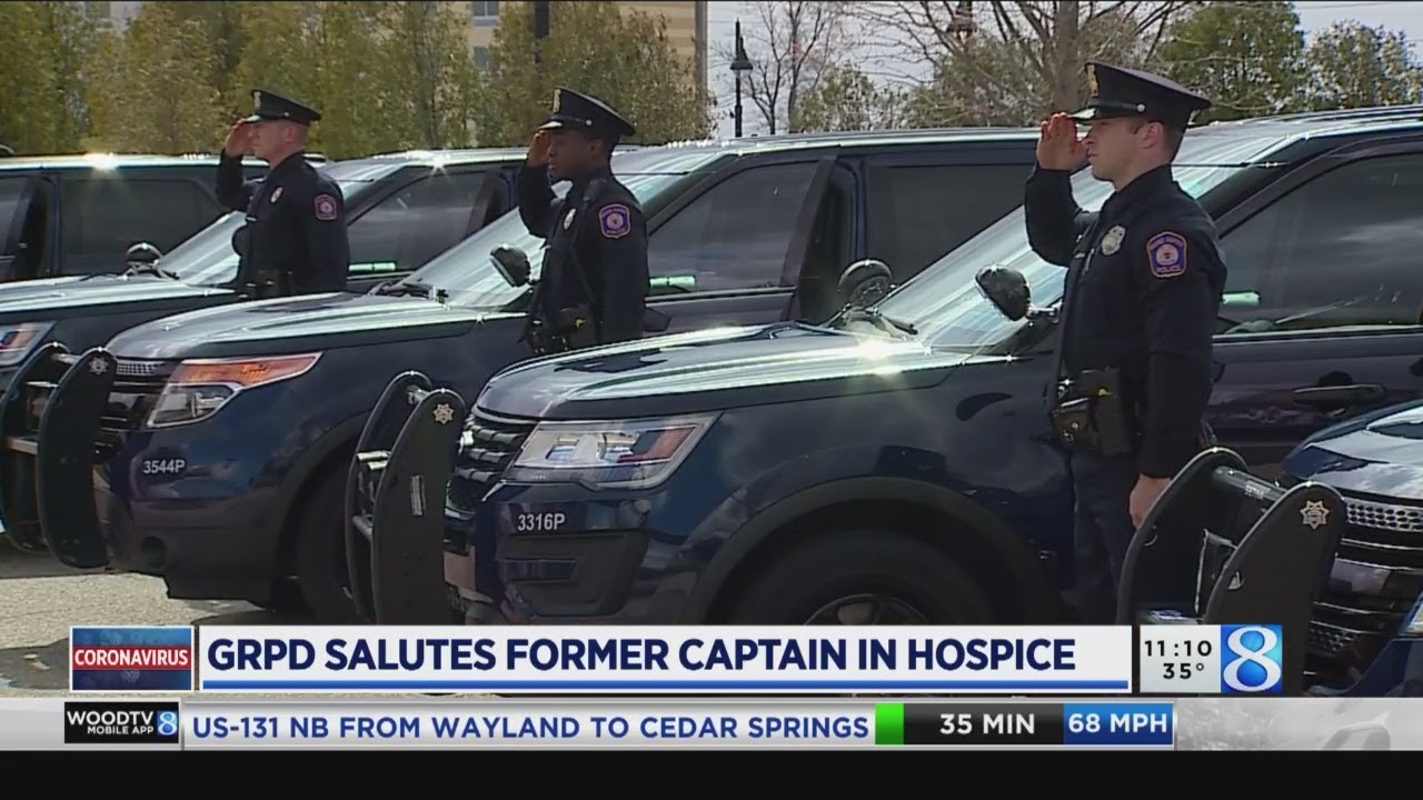 GRPD salutes oldest member of force from outside hospital - YouTube