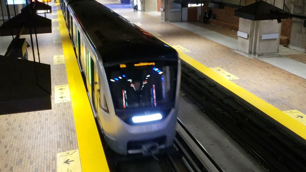 MONTREAL METRO Bonaventure Azur Arrives From Overhead Bridge View - YouTube