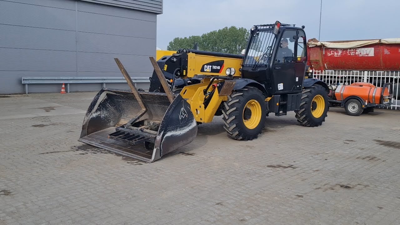 70167136 Caterpillar TH314D - YouTube